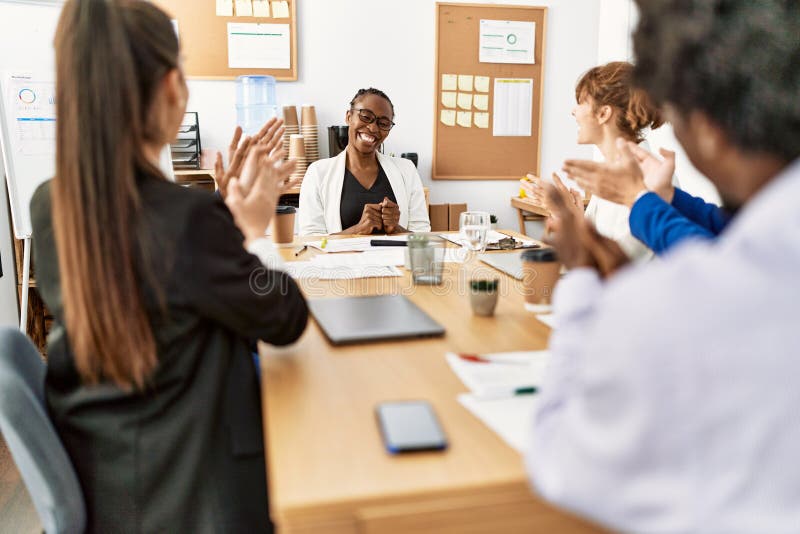 Group of Business Workers Smiling and Clapping To Partner at the Office ...