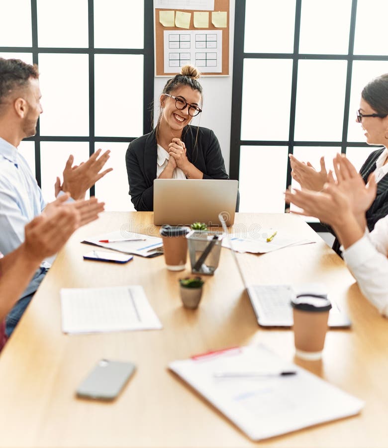 Group of Business Workers Smiling and Clapping To Partner at the Office ...