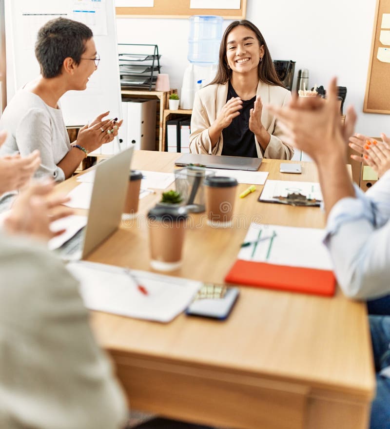 Group of Business Workers Smiling and Clapping To Partner at the Office ...