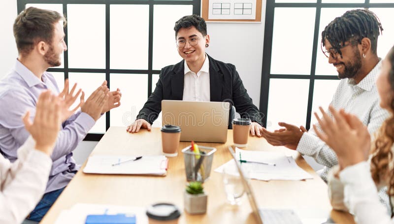 Group of Business Workers Smiling and Clapping To Partner at the Office ...