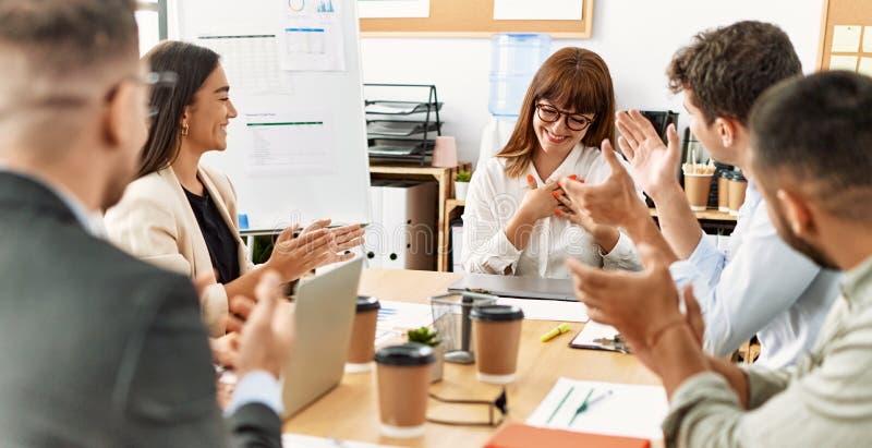 Group of Business Workers Smiling and Clapping To Partner at the Office ...
