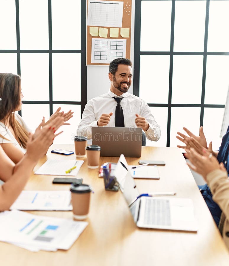 Group of Business Workers Smiling and Clapping To Partner at the Office ...