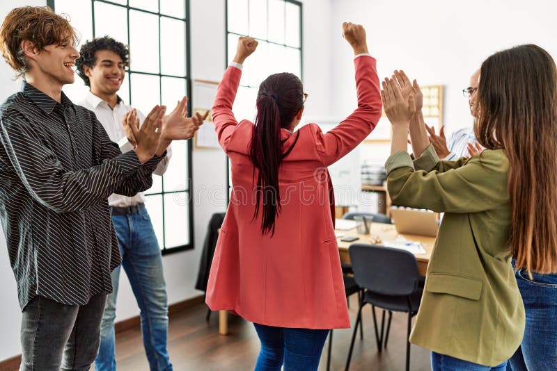 Group of Business Workers Smiling and Clapping To Partner Standing at ...