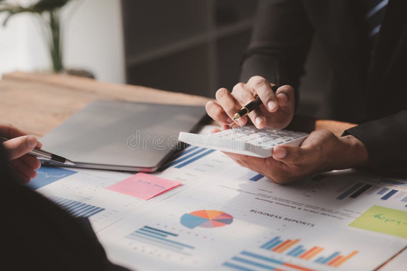 Group Businessmen Point To the Material for the Meeting, Working ...