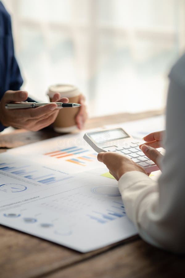 Group Businessmen Point To the Material for the Meeting, Working ...
