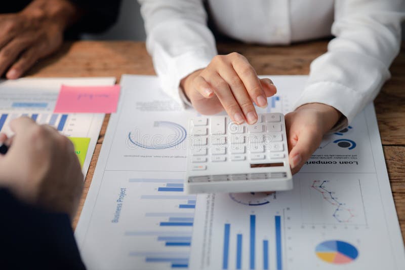 Group Businessmen Point To the Material for the Meeting, Working ...