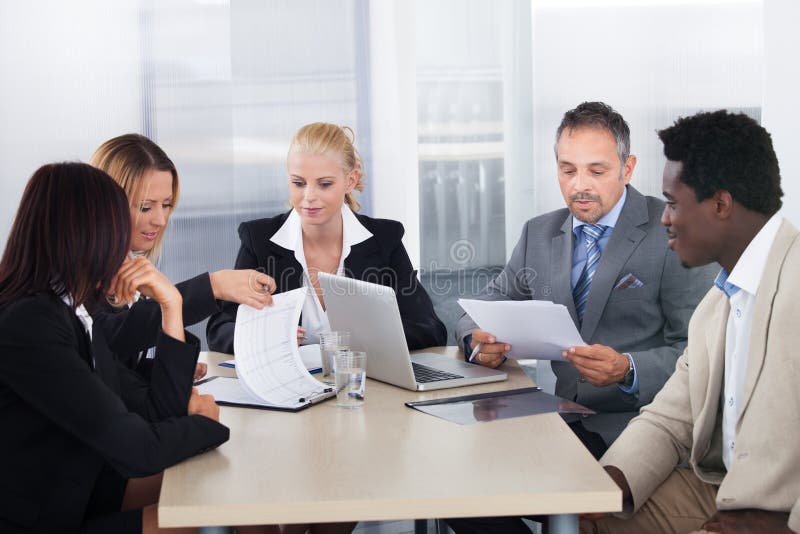 Group of Businesspeople Discussing Together Stock Image - Image of ...