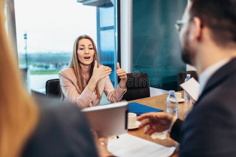Businesspeople Having a Briefing in a Boardroom. Businesspeople Working ...
