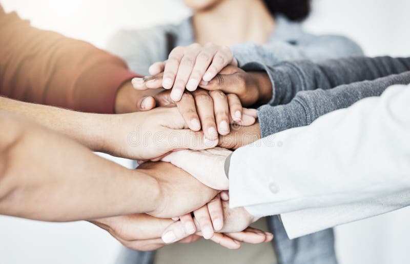 Group of Businesspeople Stacking Their Hands in Support with Their ...