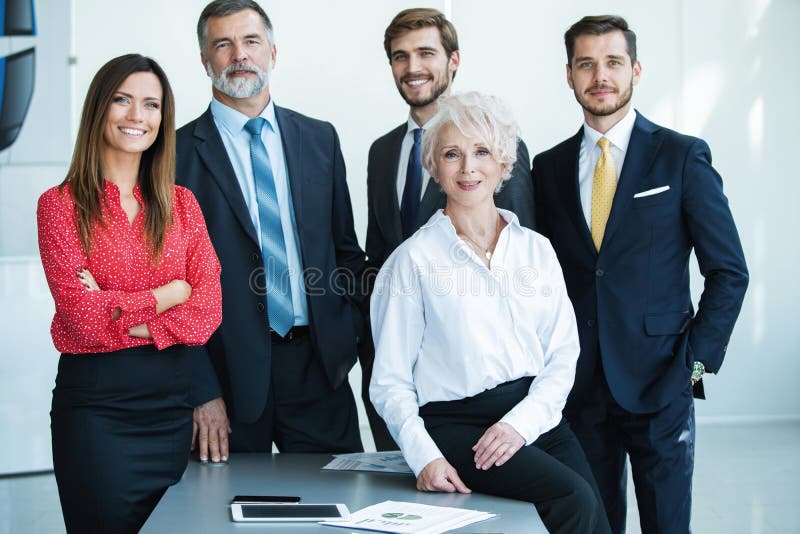 Group of Businesspeople Standing Together in Office. Stock Image ...