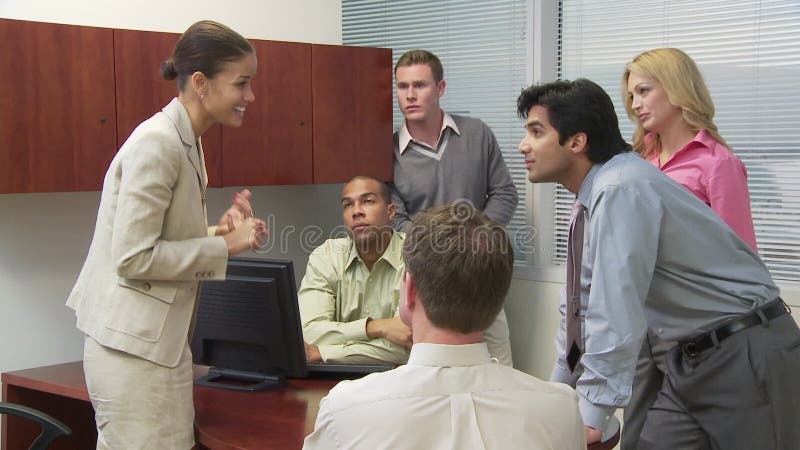 Group of Businesspeople Talking in Crowded Office Stock Video - Video ...