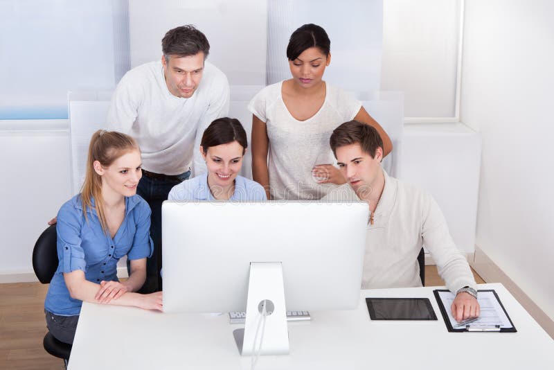 Group of Businesspeople Working on Computer Stock Photo - Image of ...