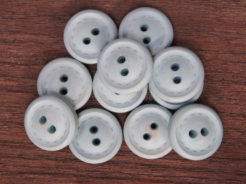 Group of Buttons on the Wooden Table Stock Photo - Image of texture ...