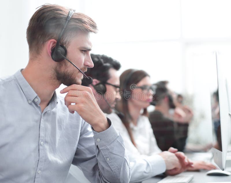 Group of Call Center Employees Sitting at the Desk Stock Photo - Image ...