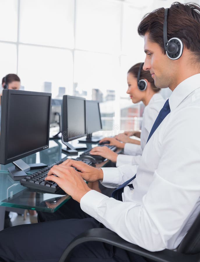 Group of Call Center Employees Working on Computers Stock Image - Image ...