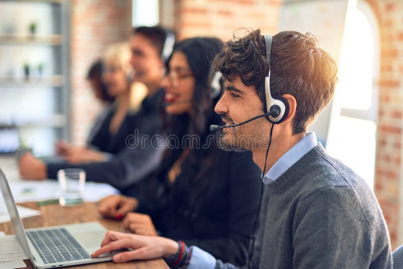 Group of Call Center Workers Smiling Happy and Confident Stock Photo ...