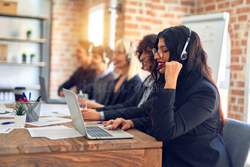 Group of Call Center Workers Smiling Happy and Confident Stock Photo ...