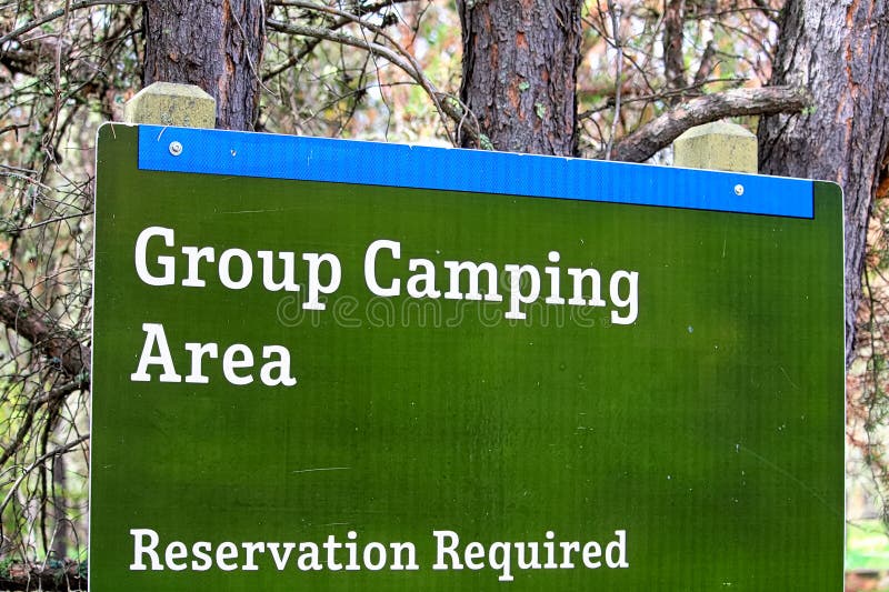 A Group Camping Area Sign Indicating Reservations are Required Stock ...