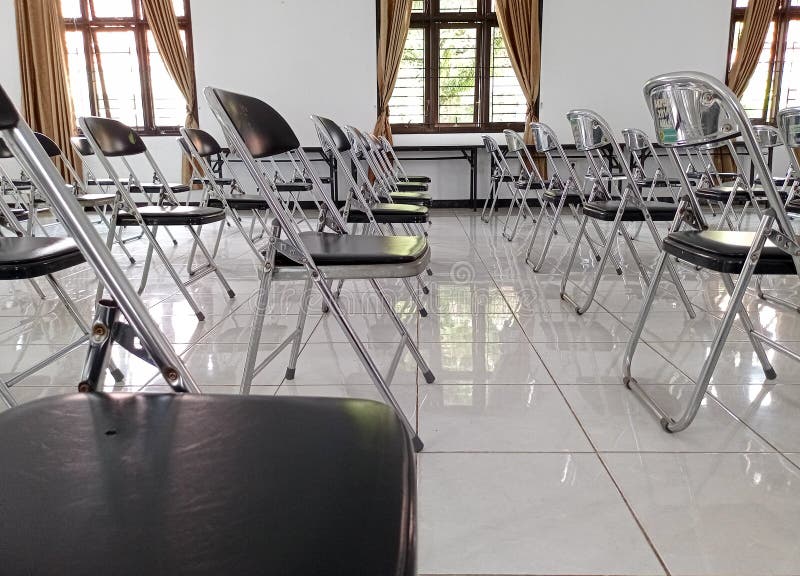 A group of chairs stock image. Image of furniture, lighting - 236540283