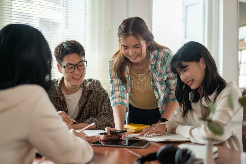 A Group of Cheerful Asian University Students or Startups are Having a ...