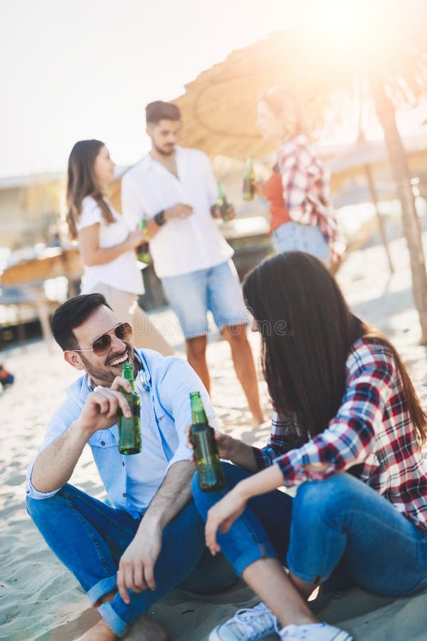 Group of Cheerful Friends Having Great Time at Beach Stock Image ...