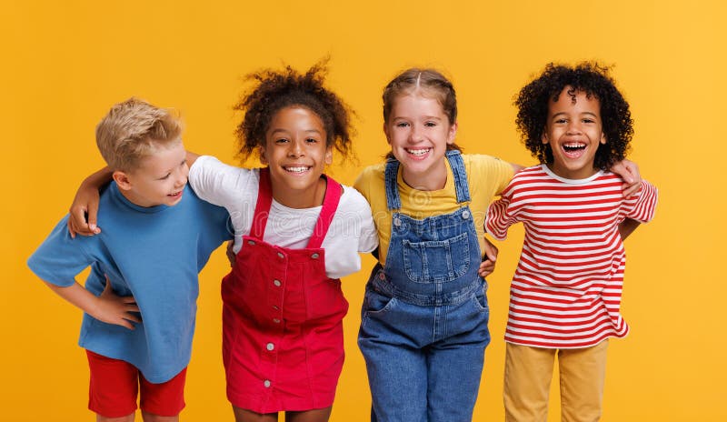 Group of Cheerful Happy Multinational Children on Yellow Background ...