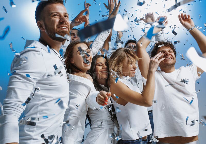 Group of Cheerful Joyful Young People Standing and Celebrating Together ...