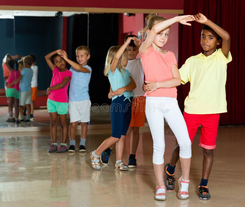 Group of Cheery Kids Dancing Salsa Dance Stock Photo - Image of kizomba ...