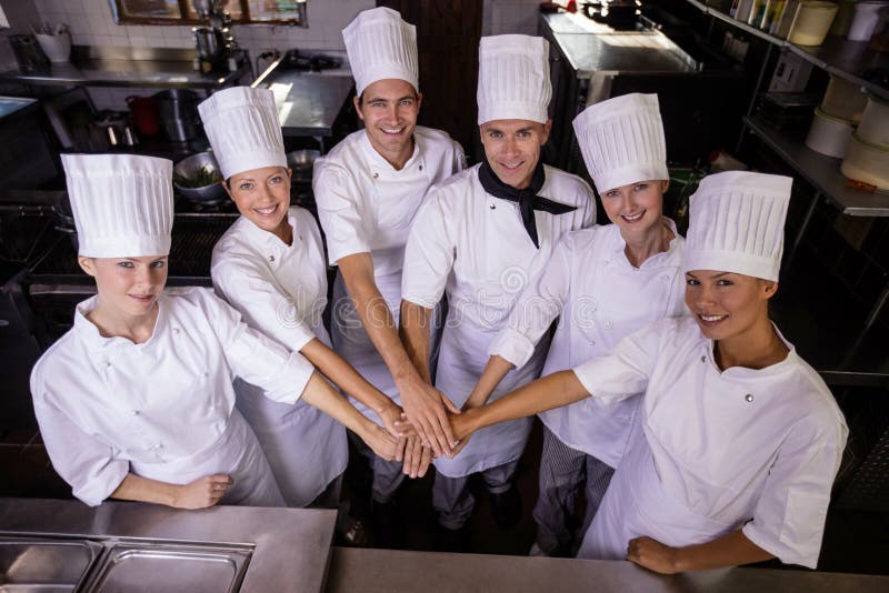 Group of Chefs Interacting Wiht Each Other in Kitchen Stock Image ...