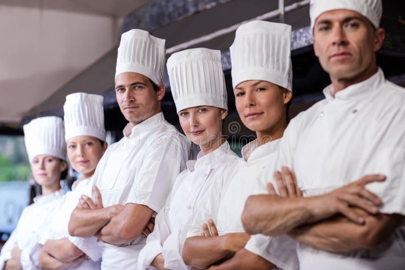 Group of Chefs Standing in Kitchen Stock Image - Image of profession ...