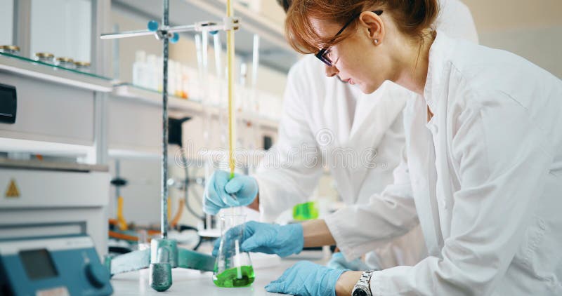 Group of Chemistry Students Working in Laboratory Stock Photo - Image ...