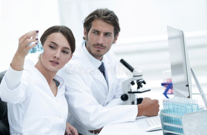 Team of Biologists Researchers Working in Laboratory Stock Photo ...