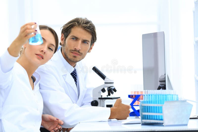 Team of Biologists Researchers Working in Laboratory Stock Photo ...