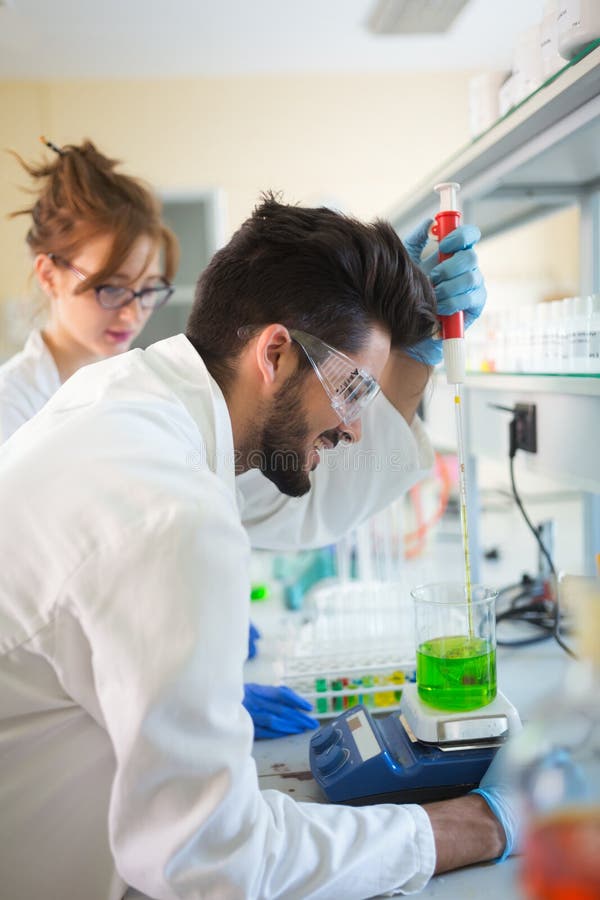 Group of Chemistry Students Working in Laboratory Stock Image - Image ...