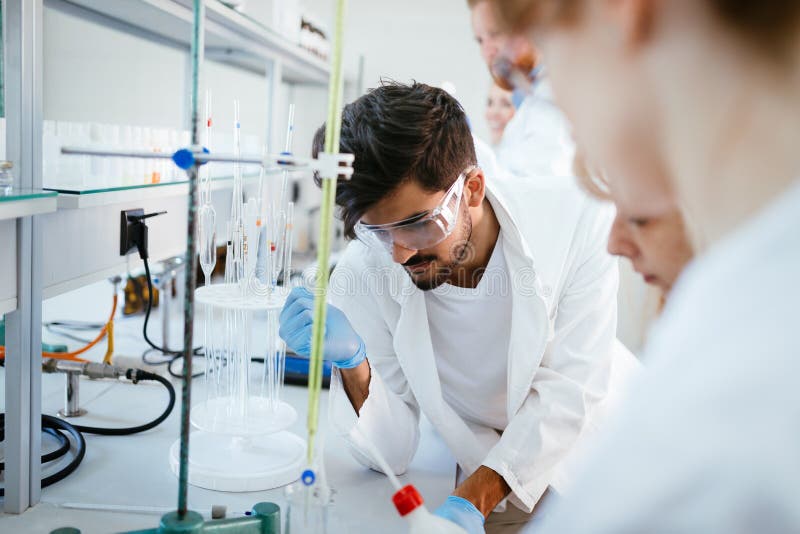 Group of Chemistry Students Working in Laboratory Stock Image - Image ...
