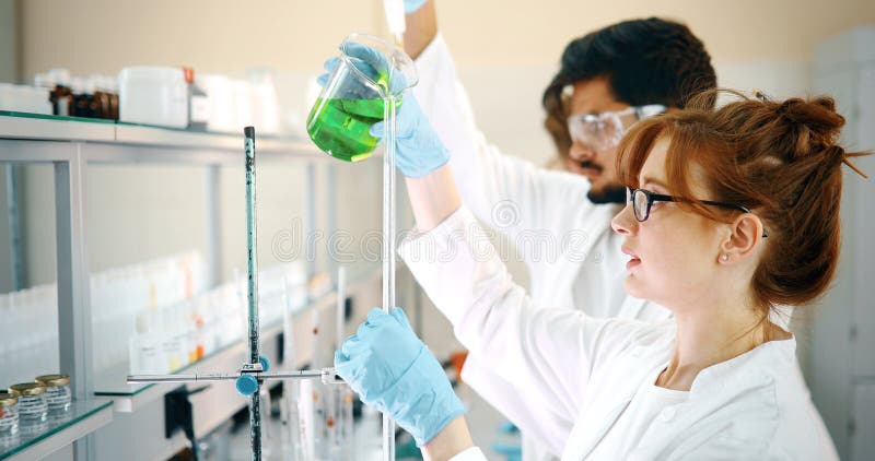 Group of Chemistry Students Working in Laboratory Stock Photo - Image ...