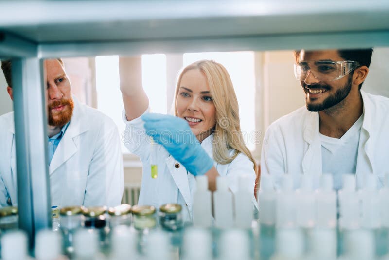 Group of Chemistry Students Working in Laboratory Stock Photo - Image ...