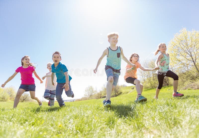 Group of Child Have Fun on a Field Stock Image - Image of children ...