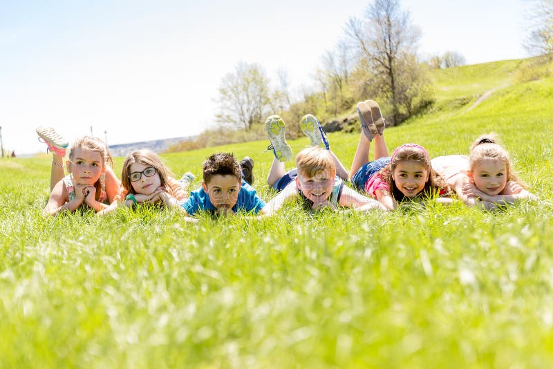 Group of Child Have Fun on a Field Stock Photo - Image of community ...