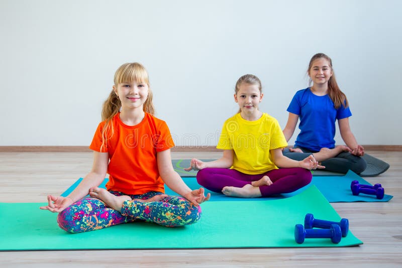 Kids doing exercises stock image. Image of body, lotus - 106637725