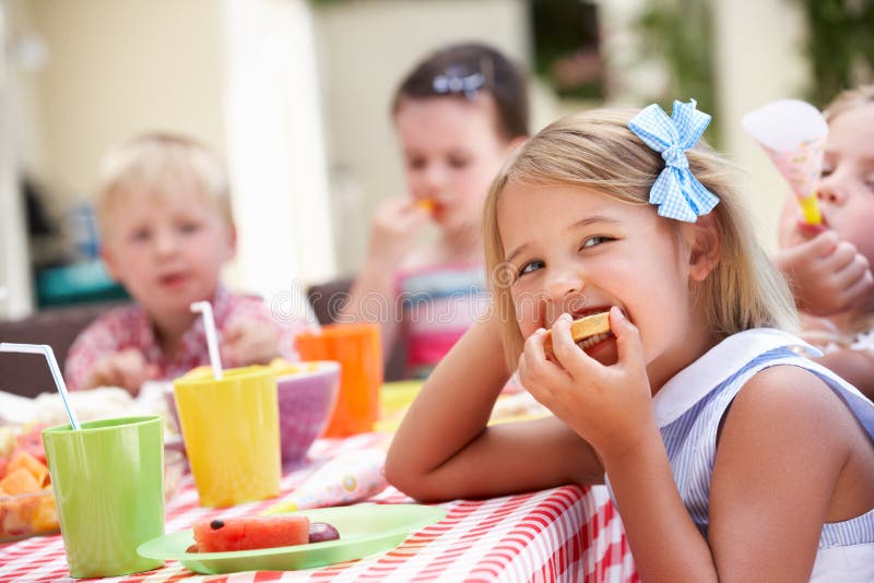 Group of Children Enjoying Outdoor Tea Party Stock Photo - Image of ...
