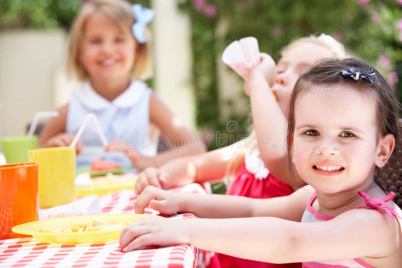 Group of Children Enjoying Outdoor Tea Party Stock Image - Image of ...