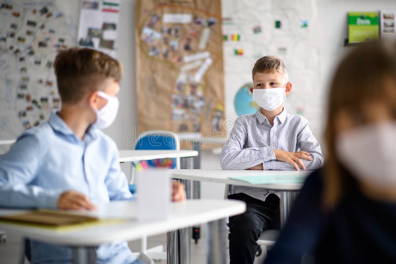 Child with Face Mask Back at School after Covid-19 Quarantine and ...