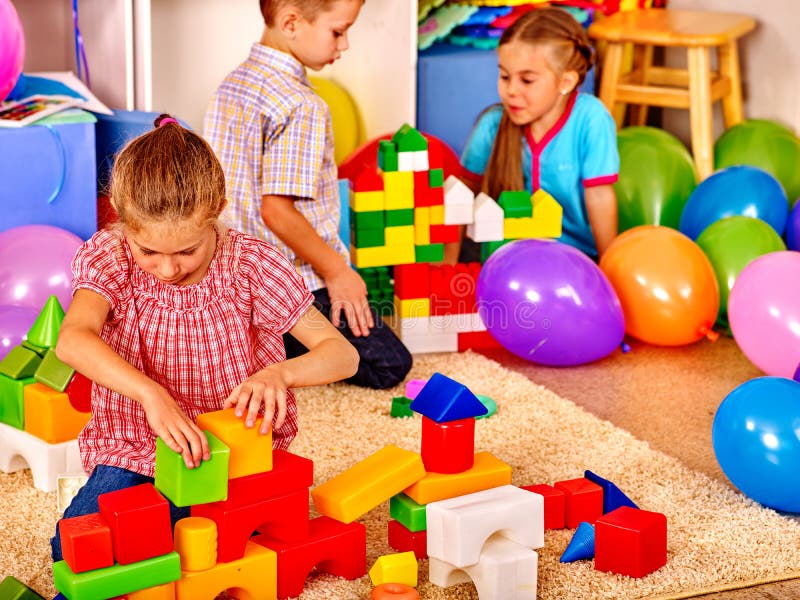 Group Children Game Blocks on Floor . Children Play in the Kids Club ...