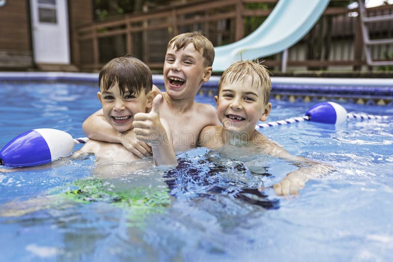 Group of Children Having Fun in Pool on the Summer Time Stock Photo ...
