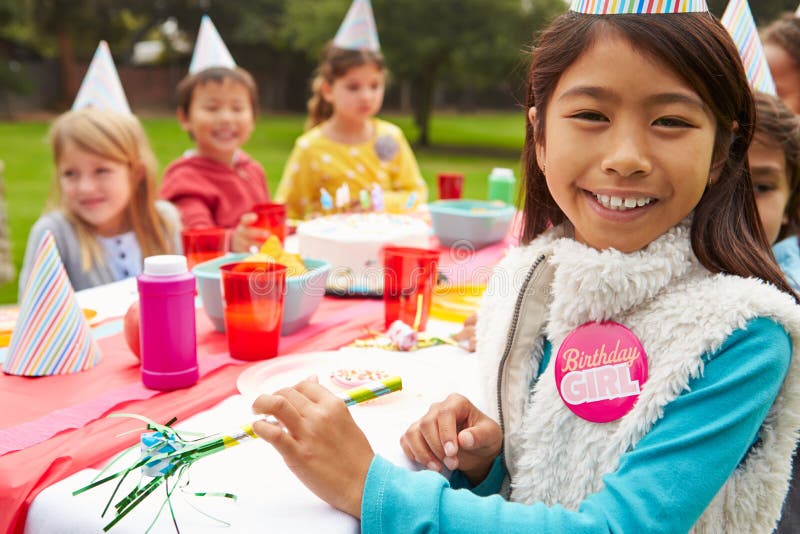 Group of Children Having Outdoor Birthday Party Stock Photo - Image of ...