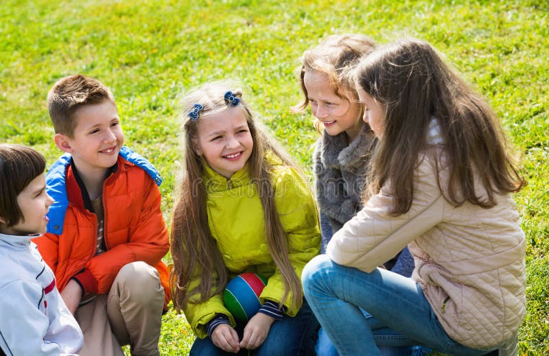 Group of Children Laughing in Spring Park Stock Photo - Image of ...