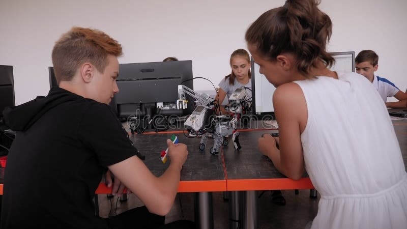 Group of Children are Making Robots from the Constructor in School of ...