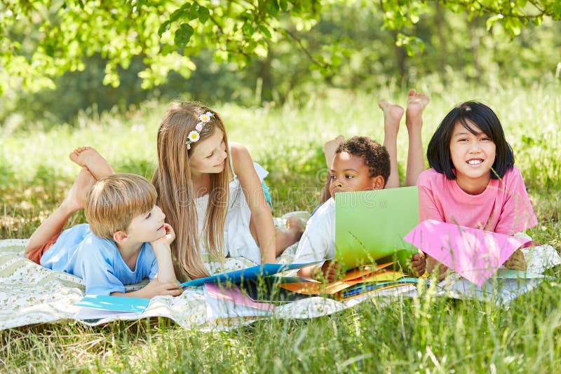 Children on a meadow stock image. Image of girl, blue - 1361533