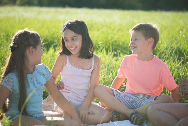 Group of Children Playing on Grass Stock Photo - Image of caucasian ...